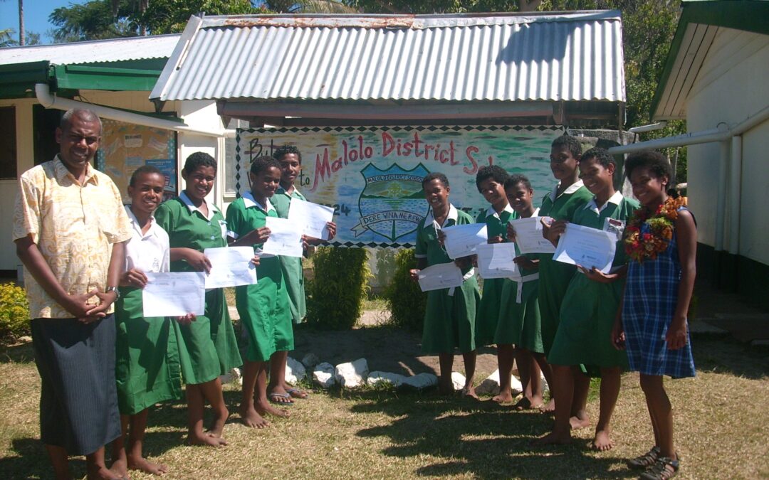 Students of Malolo District School with thier certificates | MES Fiji